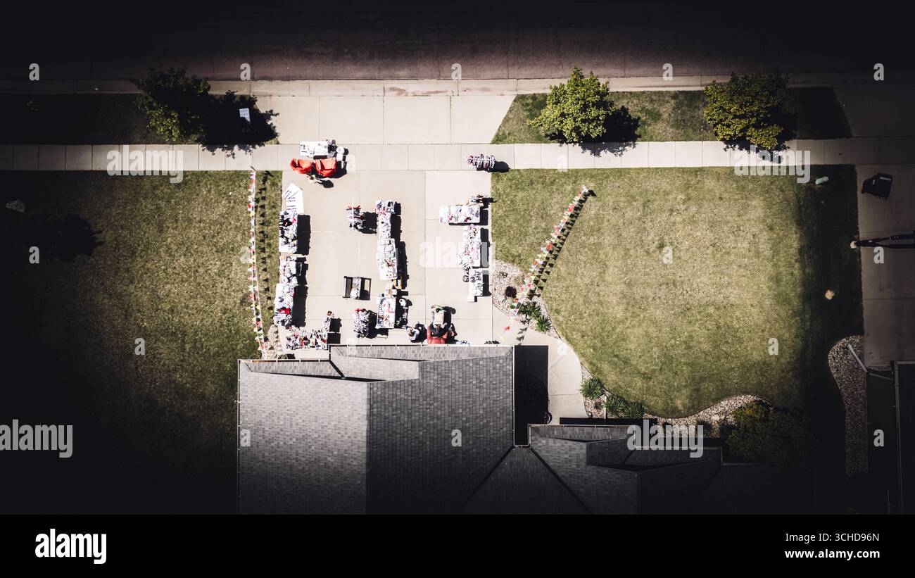 Aerial view above a garage yard sale in a residential area Stock Photo ...