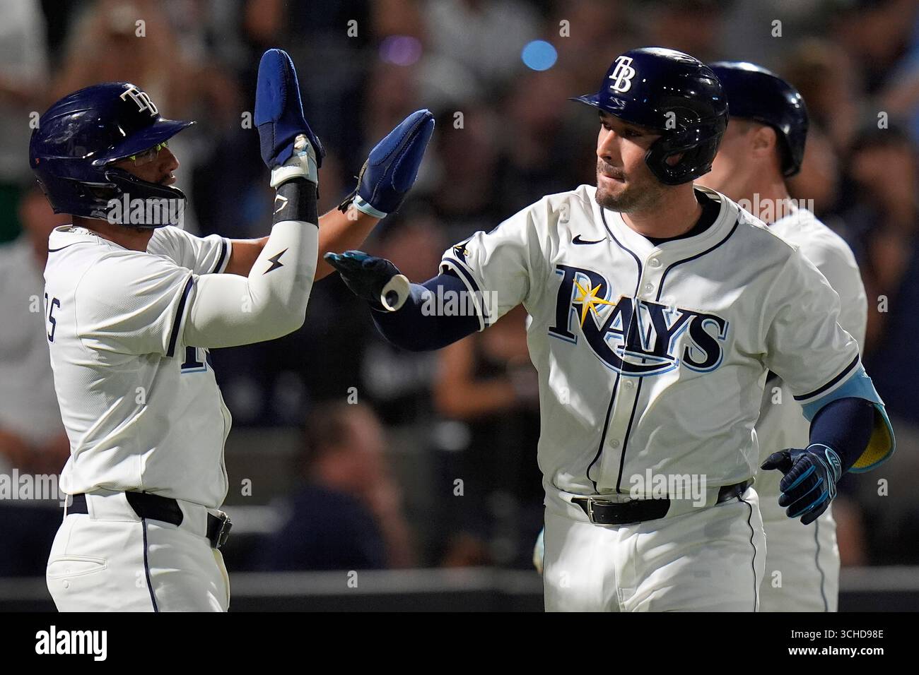 Tampa Bay Rays' Nick Fortes, right, celebrates his three-run home run ...