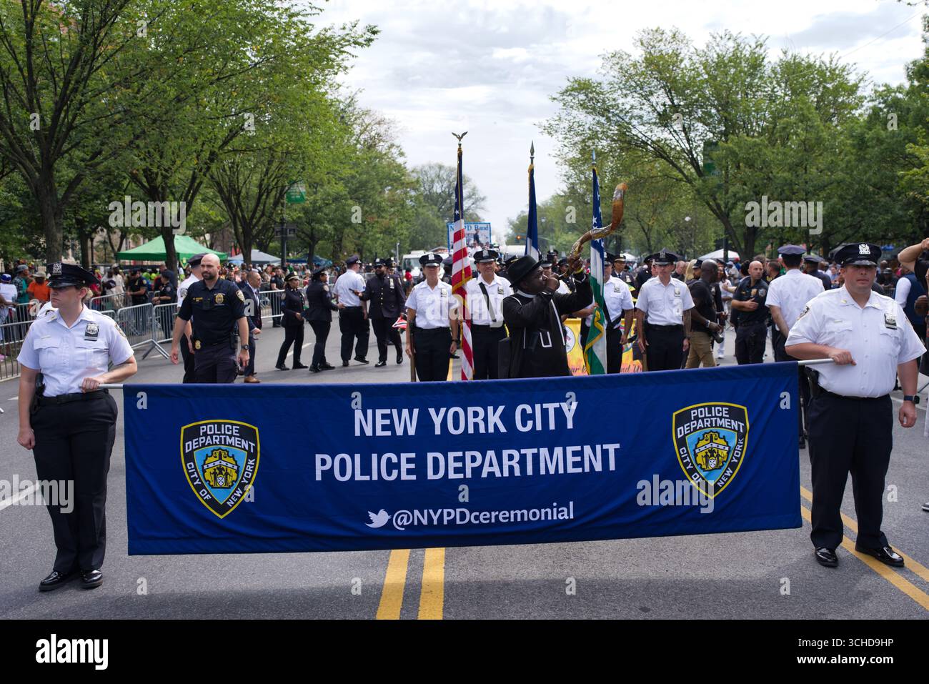 New York City Police Department officers are participating in a parade ...