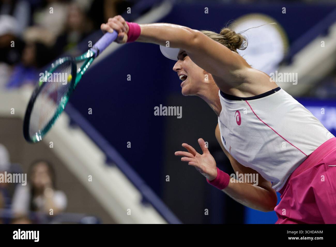 Beatriz Haddad Maia, of Brazil, serves to Amanda Anisimova, of the ...