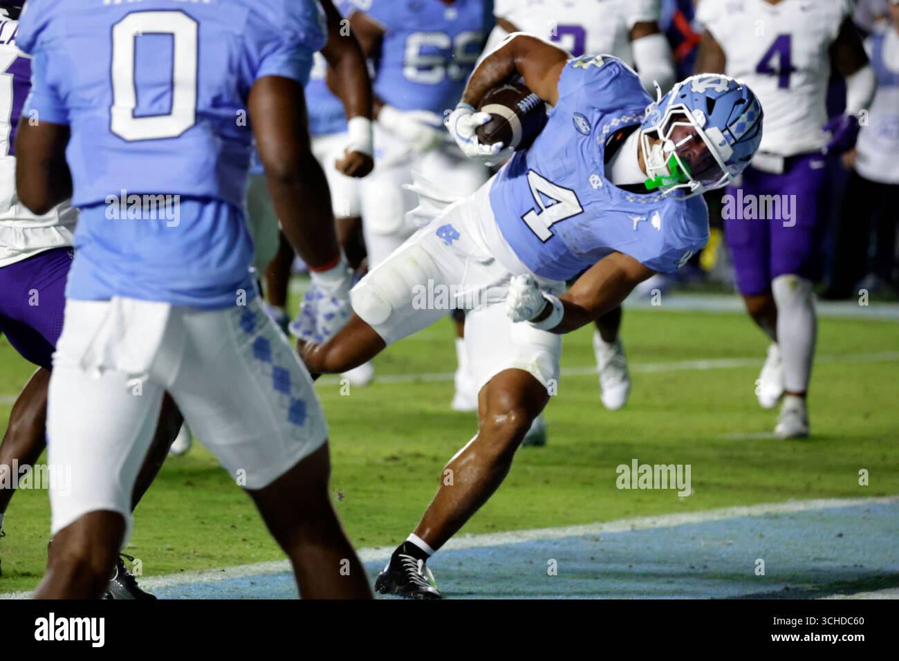 North Carolina running back Caleb Hood (4) runs for a touchdown during ...