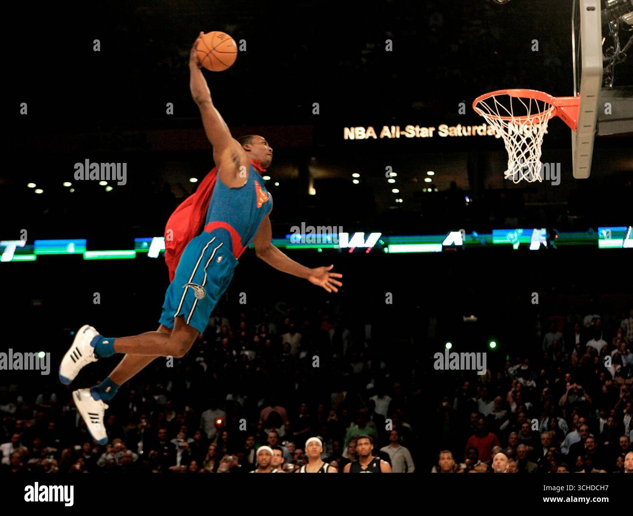 FILE - Wearing a Superman costume, Orlando Magic forward Dwight Howard ...