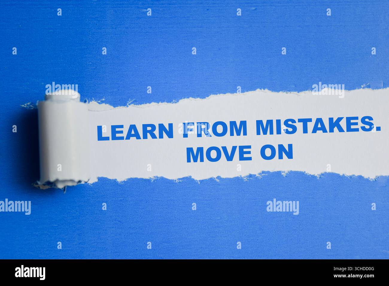 Learn from mistakes. Move on Text written in torn paper Stock Photo - Alamy