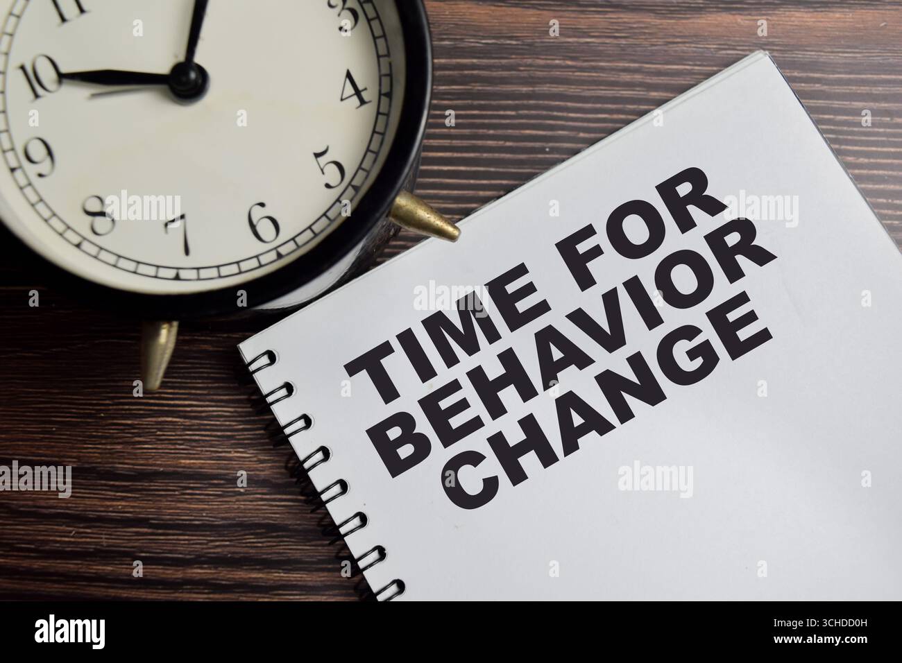 Concept of Time for behavior change write on book isolated on Wooden ...