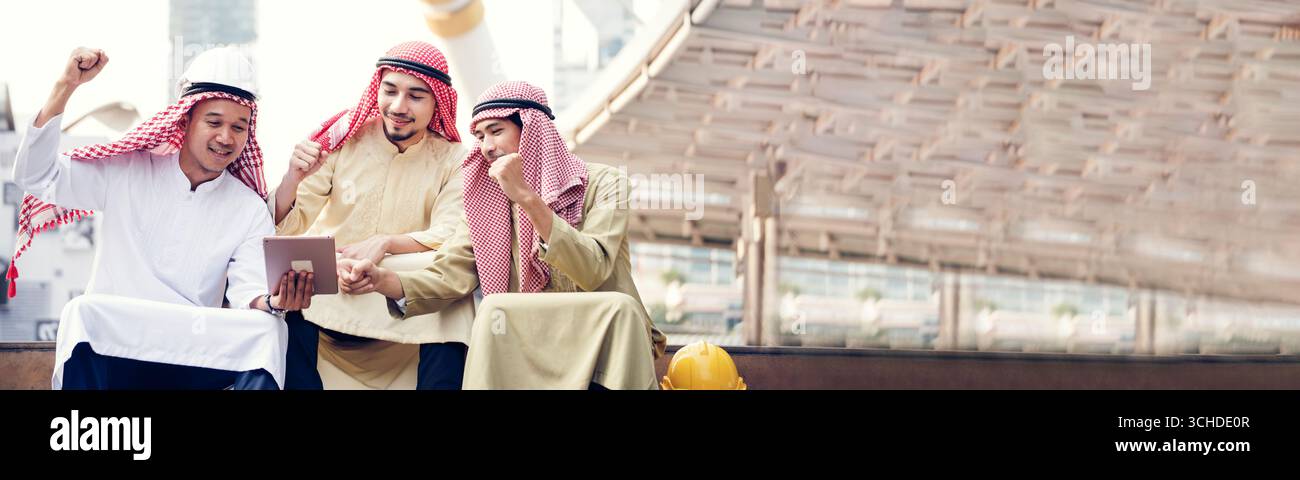 Banner Arab team hold digital tablet uae union teamwork people ...