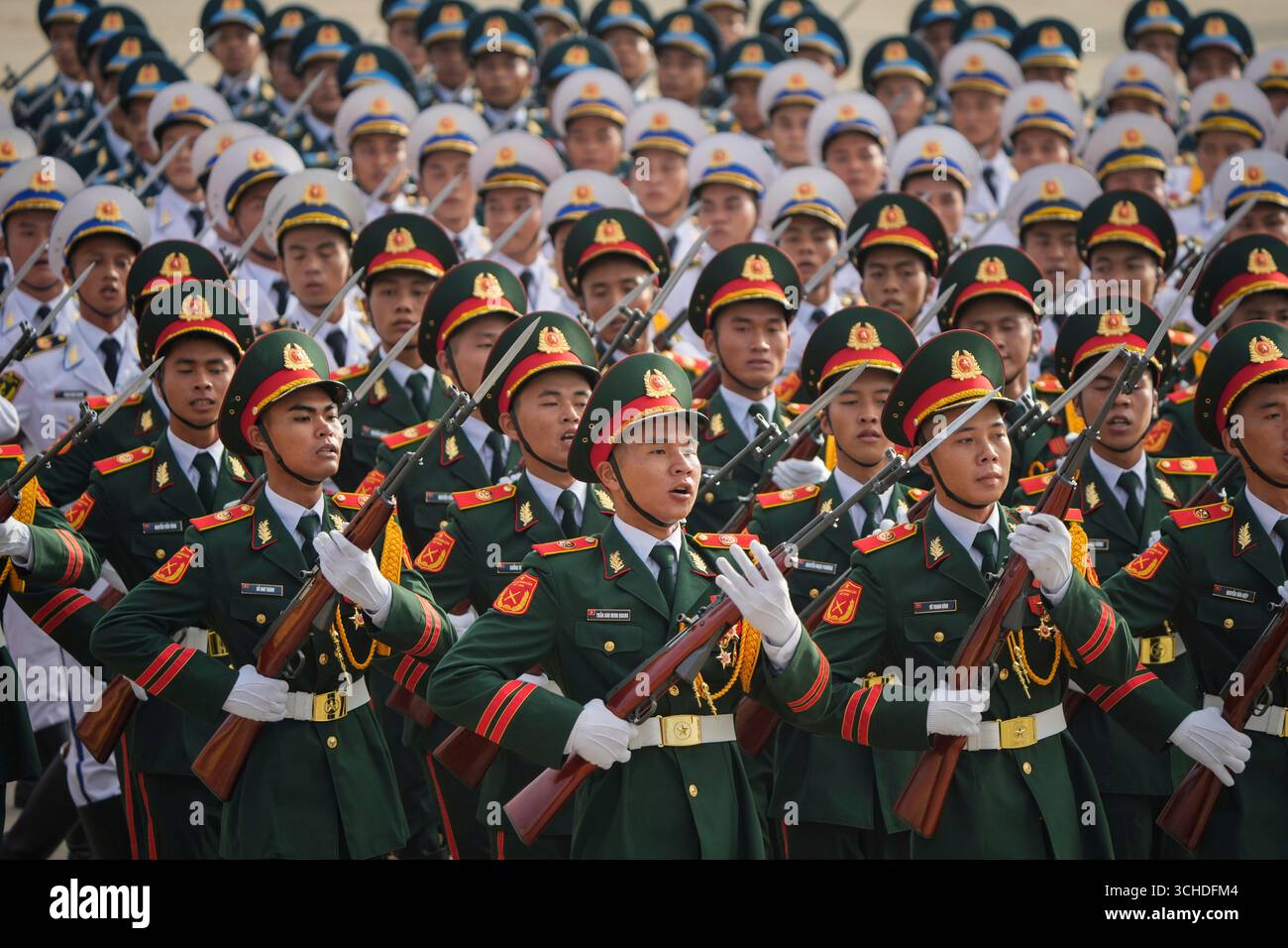 Vietnamese troops march during a parade celebrating the 80th ...