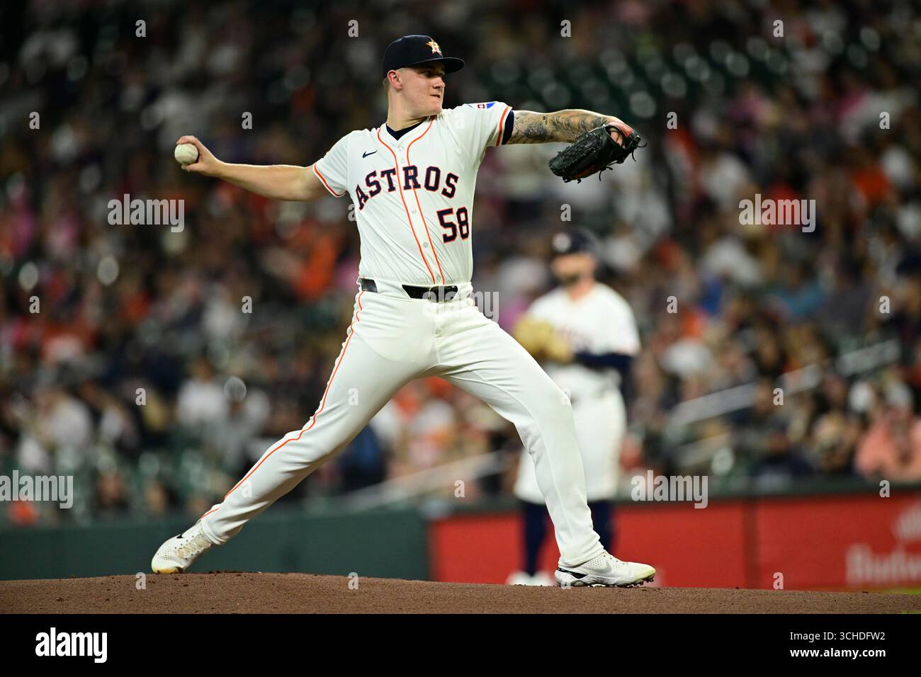 Houston Astros pitcher Hunter Brown (58) warms up during the MLB game ...