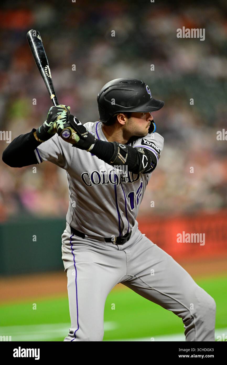 Colorado Rockies third base Kyle Karros (12) singles to center in the ...