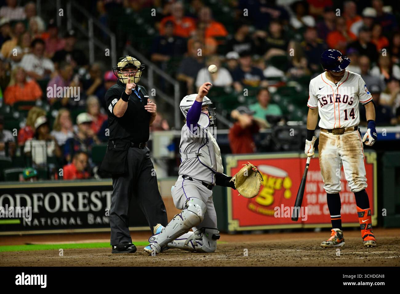 Home plate umpire Cory Blaser (89) calls a strike during an MLB game ...