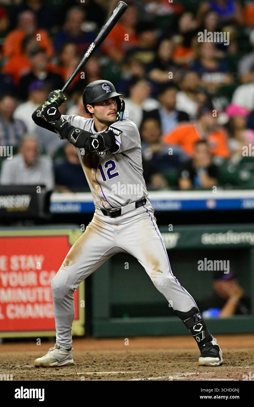 Colorado Rockies third base Kyle Karros (12) watches the ball in the ...