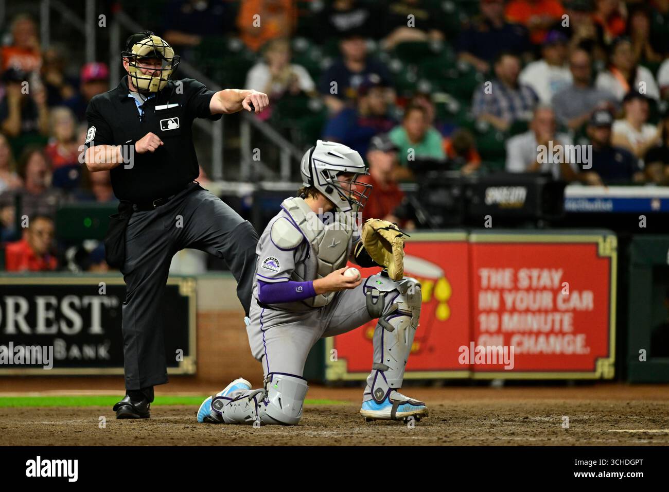 Home plate umpire Cory Blaser (89) calls a third strike in the seventh ...