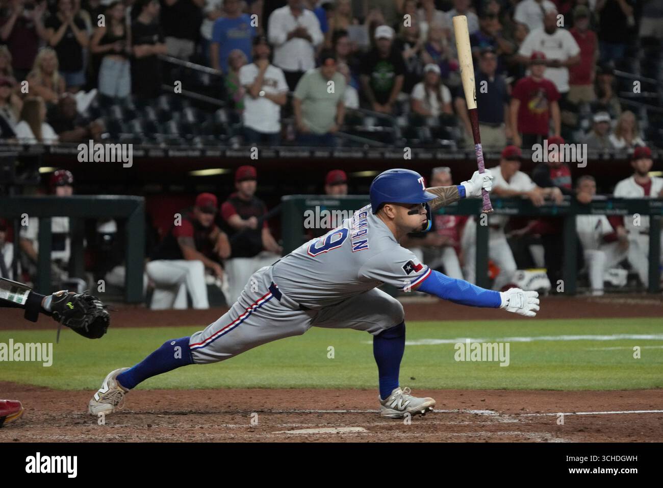 Texas Rangers' Cody Freeman hits an RBI single against the Arizona ...