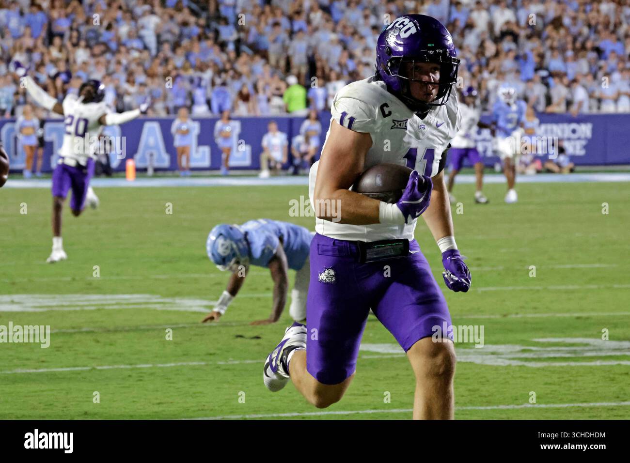 TCU's Devean Deal (11) runs a recovered fumble in for a touchdown ...