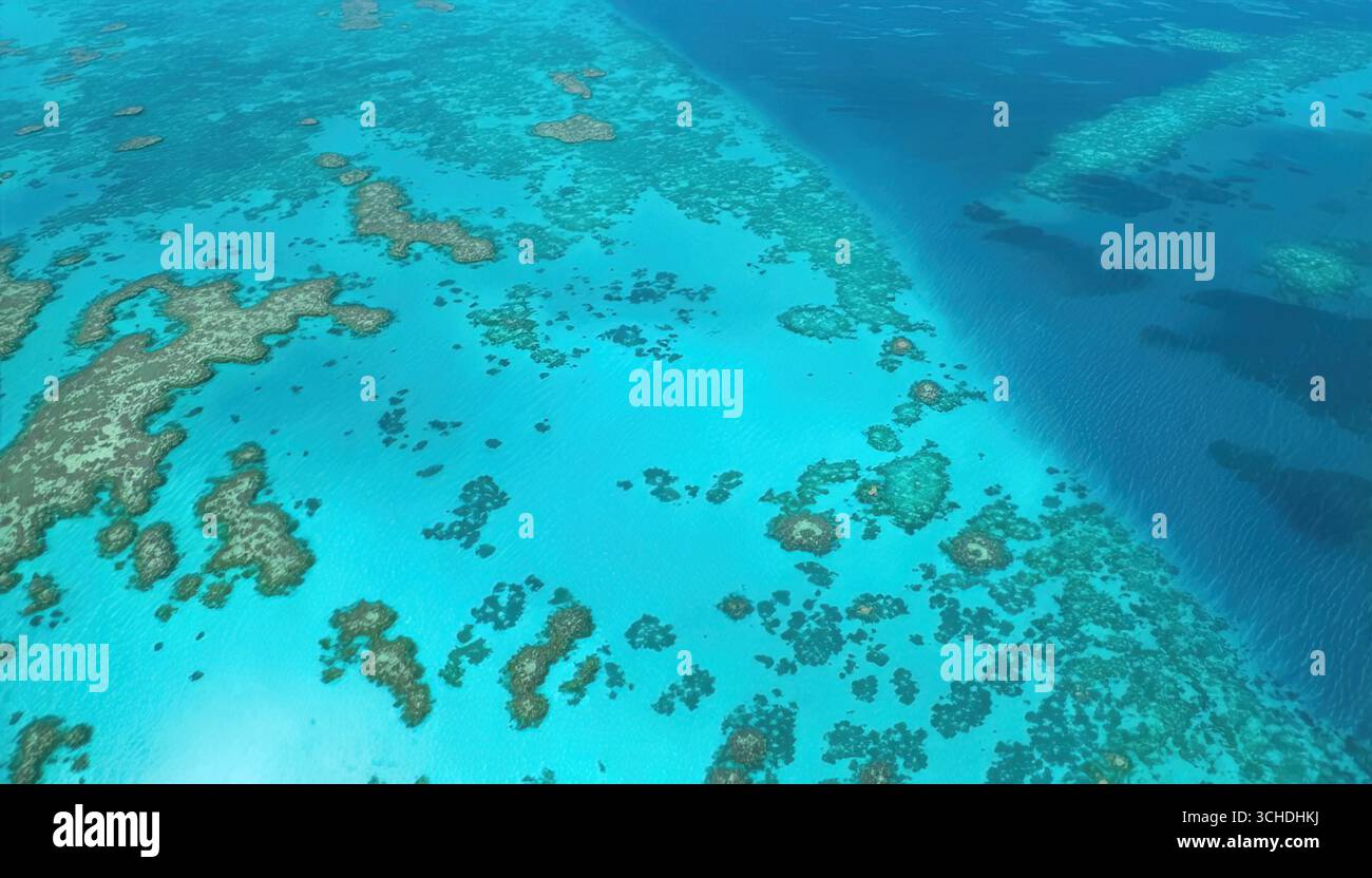 Aerial view of Great Barrier Reef with turquoise waters and vibrant ...