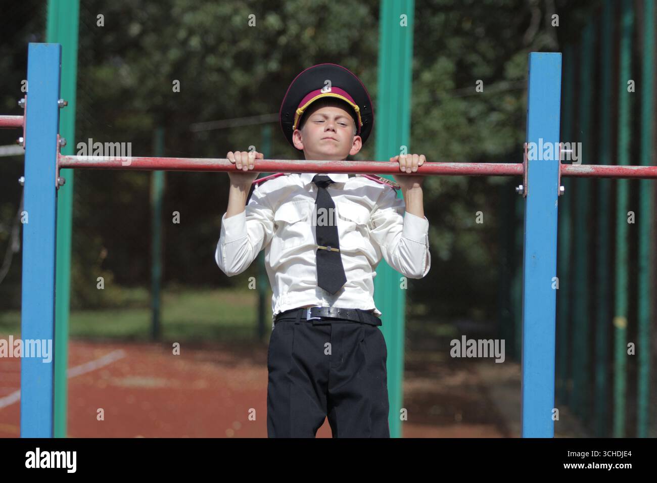 Non Exclusive: A cadet performs the flexed-arm hang as the Volodymyr ...