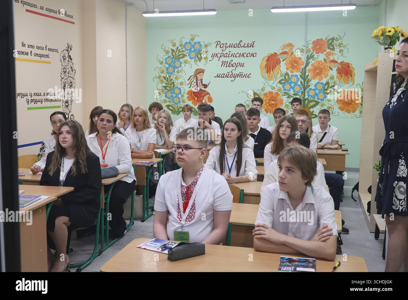 Non Exclusive: Students sit at their desks during the First Bell ...