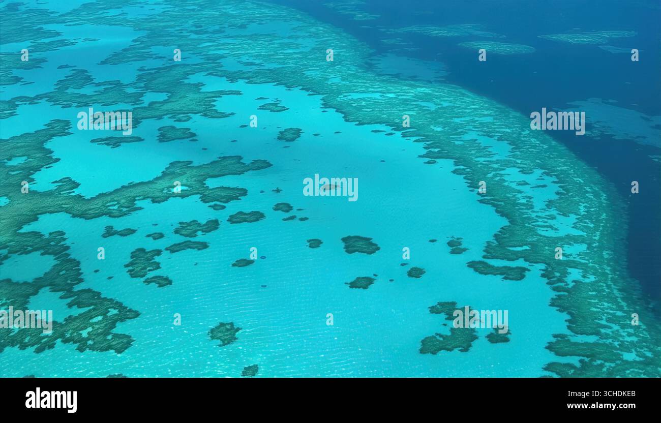 Great Barrier Reef aerial landscape with coral reefs and crystal-clear ...