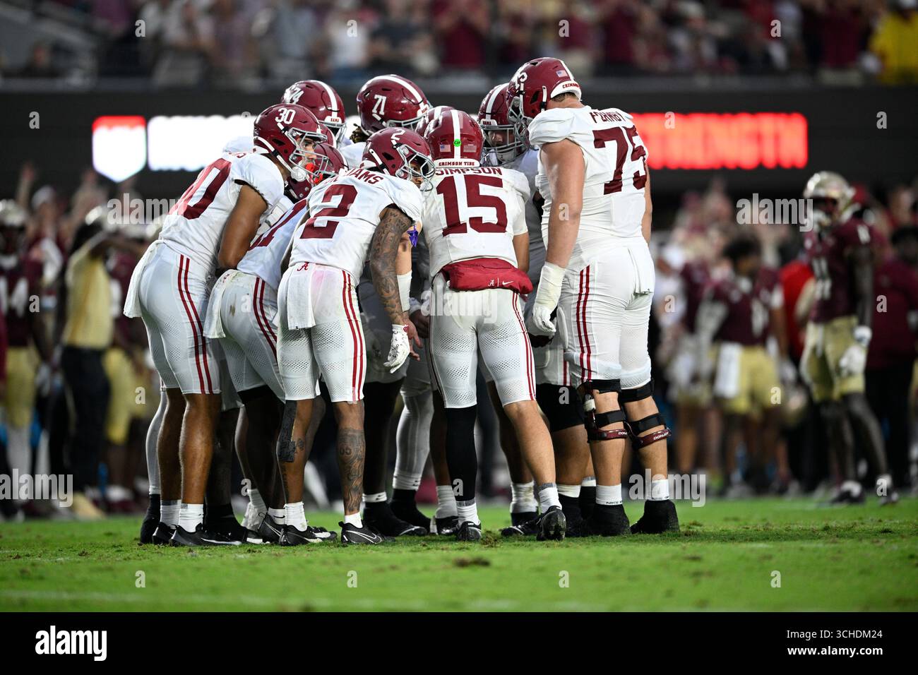 Alabama quarterback Ty Simpson (15) calls a play in the huddle during ...