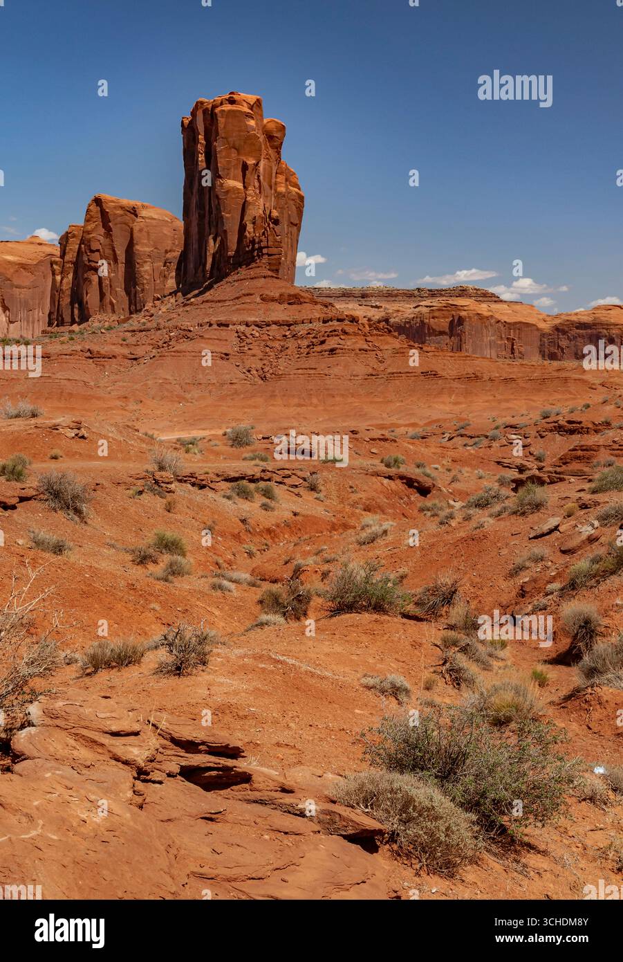 A rock tower stand tall above the velley floor, Monument Valley Navajo ...