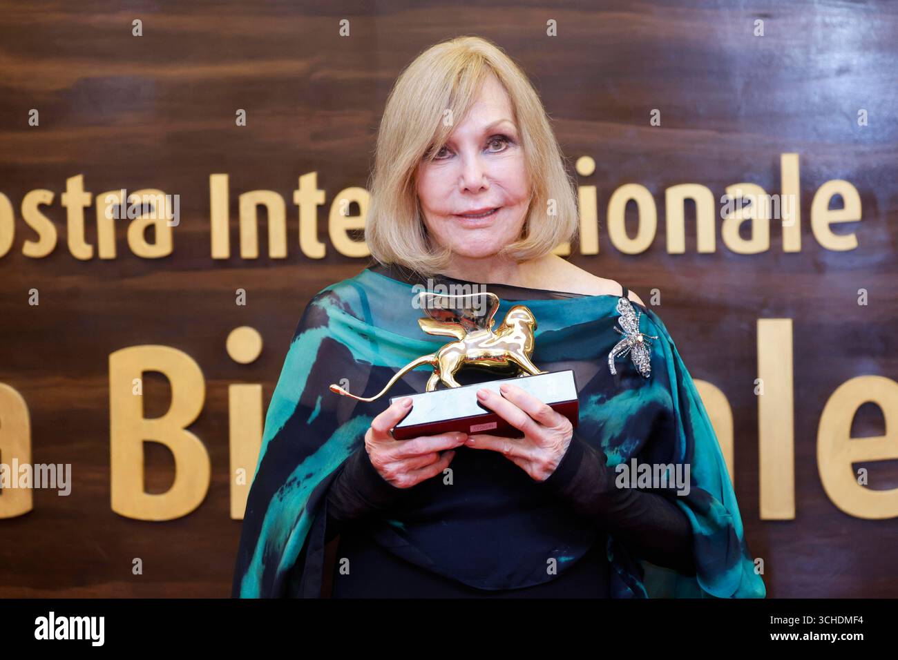 Kim Novak poses with her Golden Lion Lifetime Achievement Award during ...