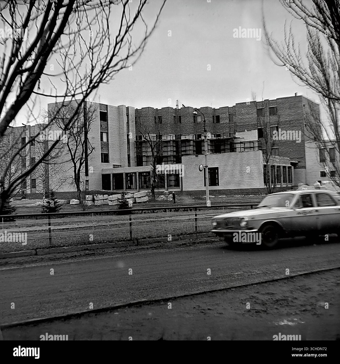 A historical shot capturing the construction of a new mud bath clinic ...