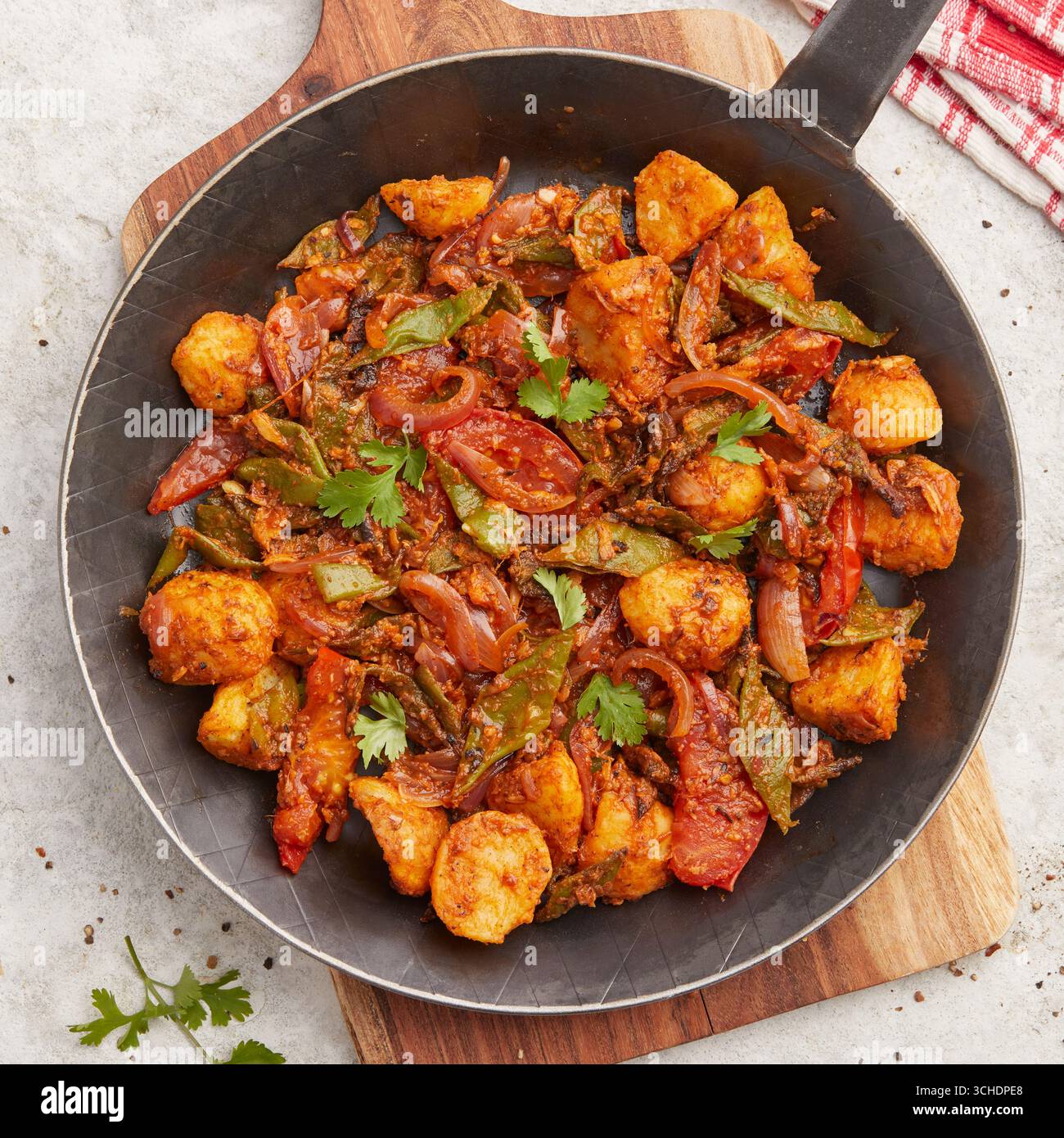 Indian-style potatoes and coco beans Stock Photo - Alamy