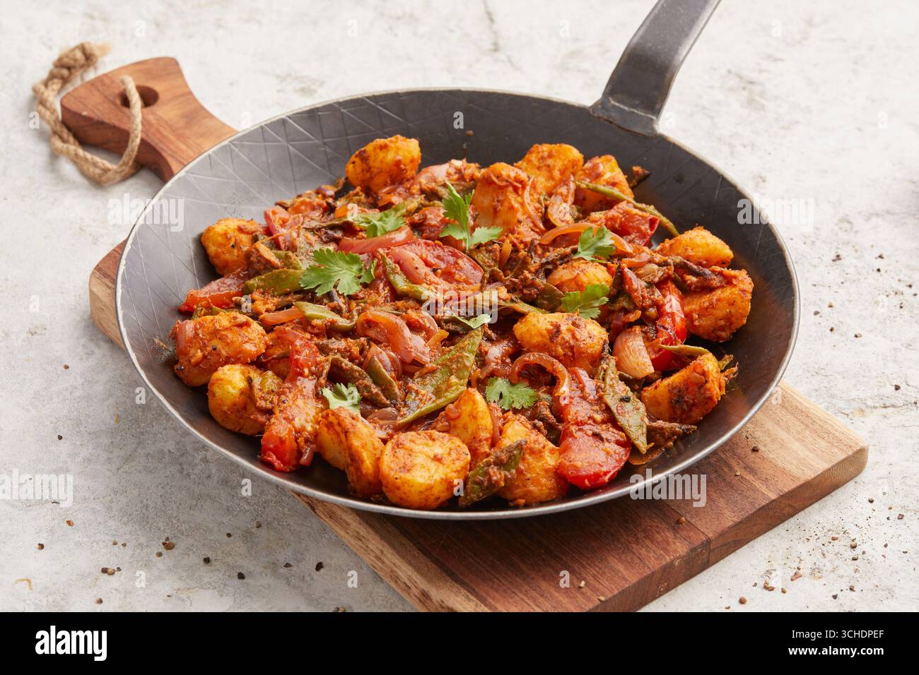 Indian-style potatoes and coco beans Stock Photo - Alamy