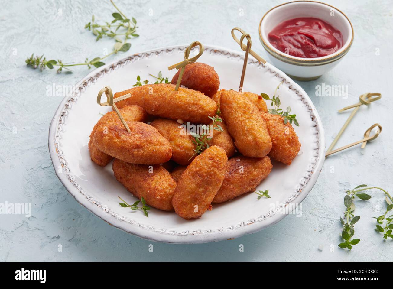 Beetroot croquettes with BBQ tomato sauce Stock Photo - Alamy