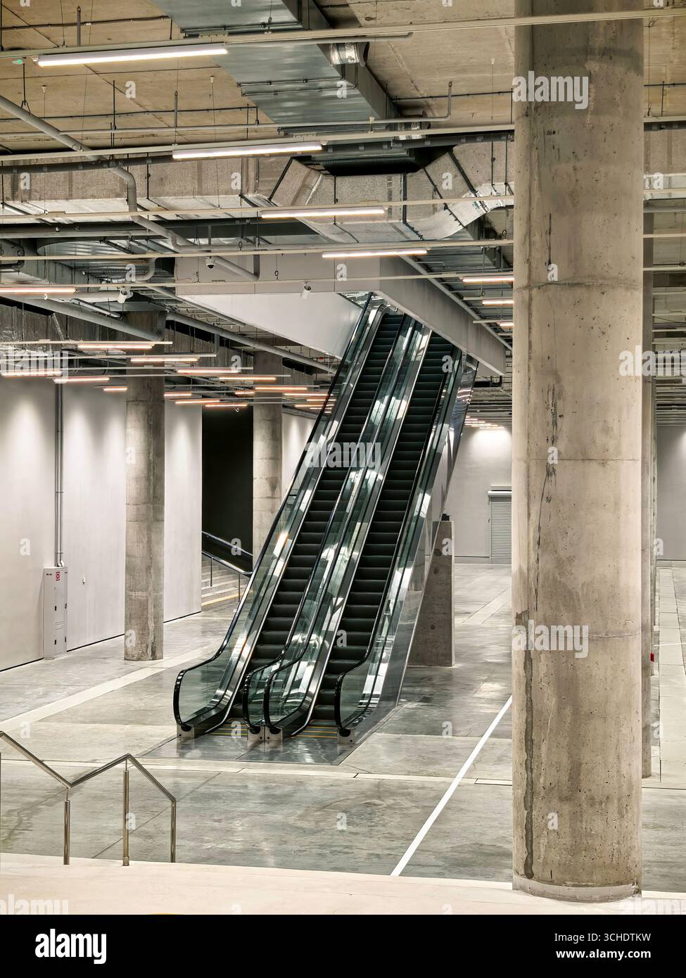 Empty Underground Area with Escalator Stock Photo - Alamy
