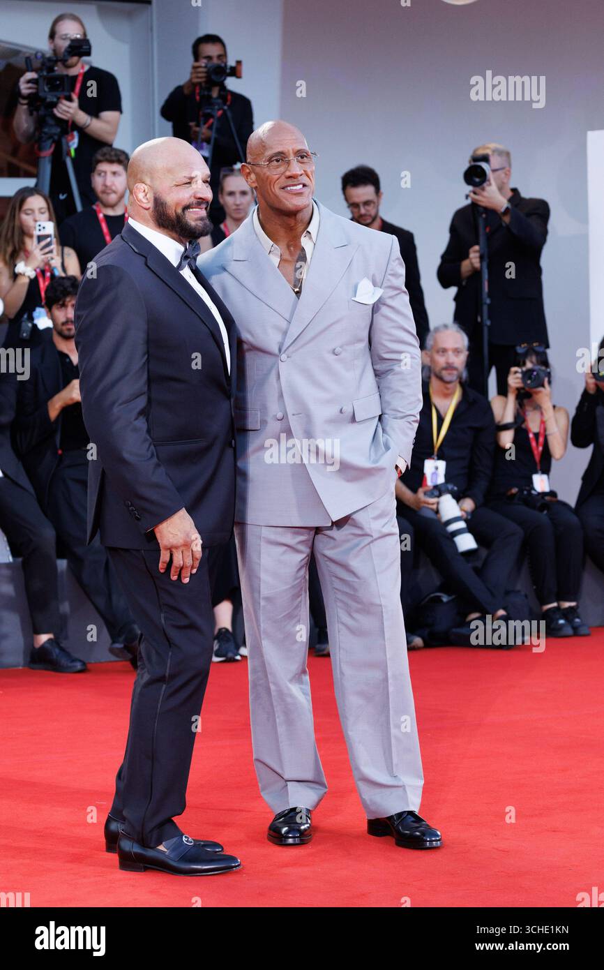 Dwayne Johnson and Mark Kerr attend "The Smashing Machine" red carpet ...