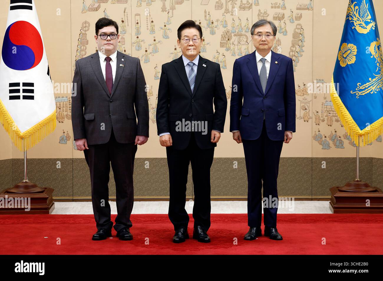 New Bangladeshi envoy in Seoul President Lee Jae Myung (C) poses for a photo with new ...