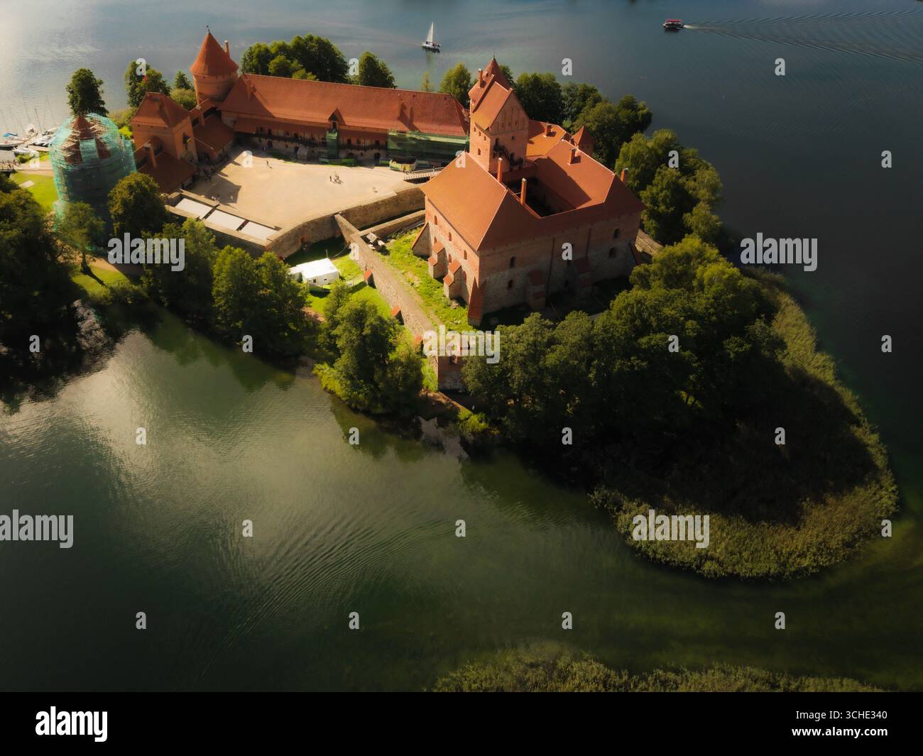 Aerial view of the imposing Trakai Island Castle with its red brick ...
