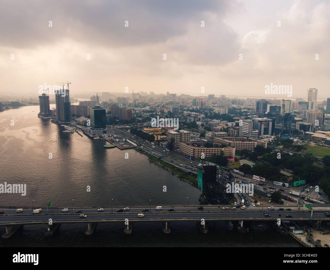 Aerial view of the expansive waterway reflecting the overcast sky, with ...