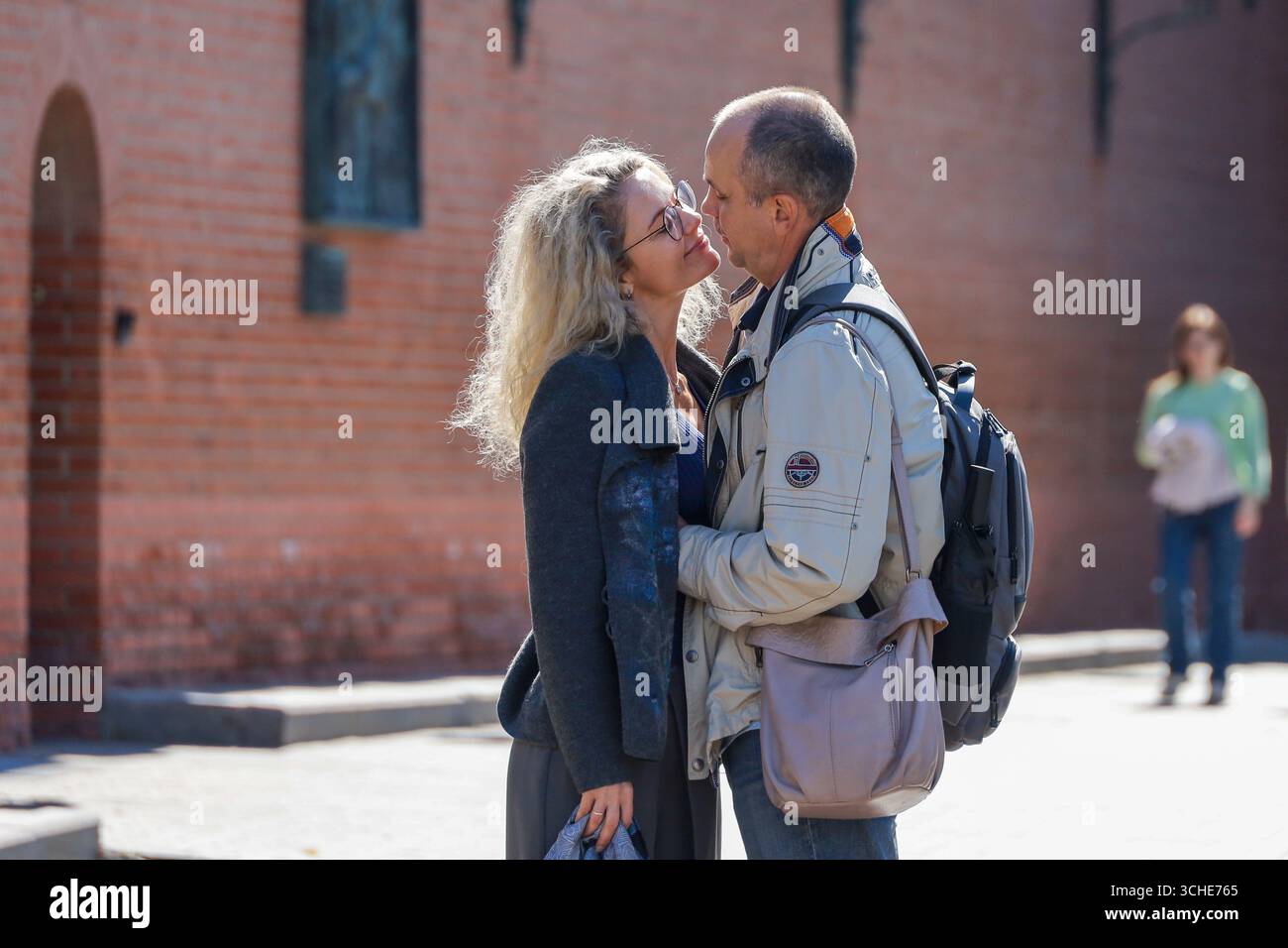 Blonde girl kissing hi-res stock photography and images - Alamy