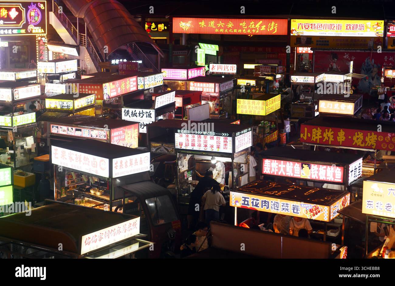 Aerial photo shows the bustling night market in Lu'an City, east China ...