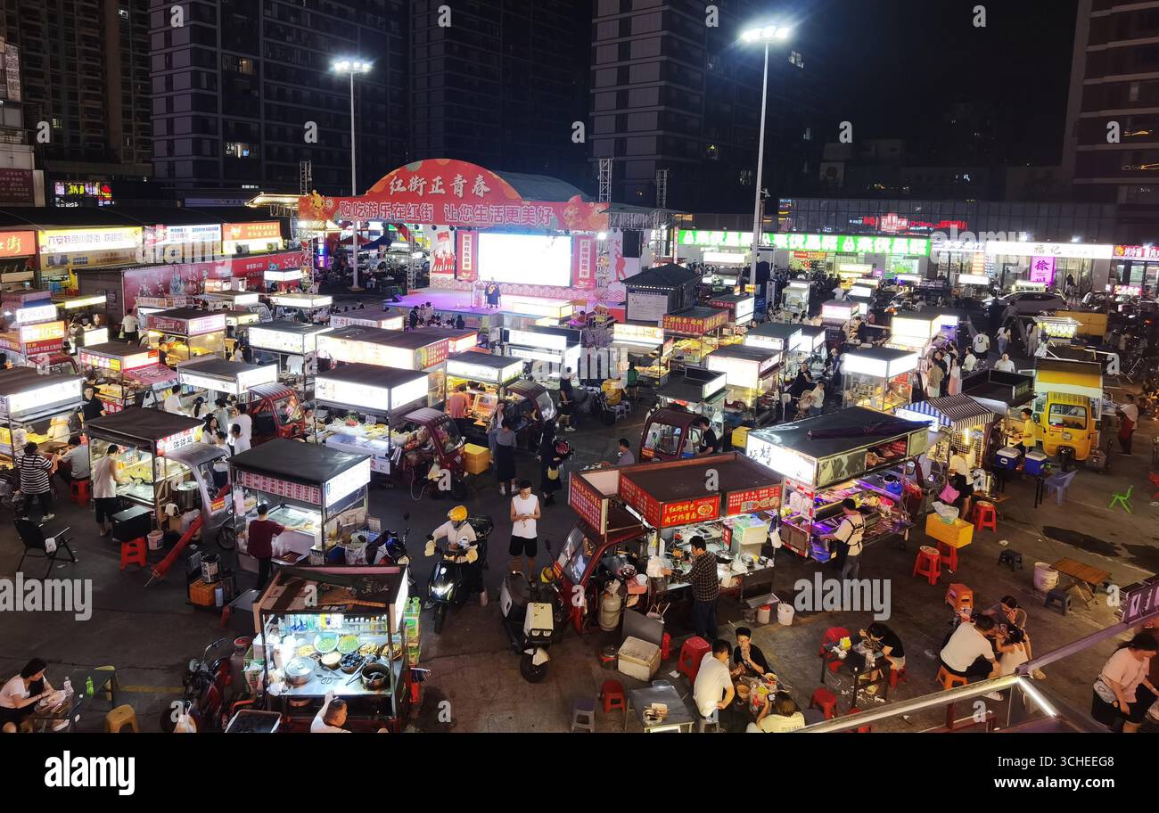 Aerial photo shows the bustling night market in Lu'an City, east China ...