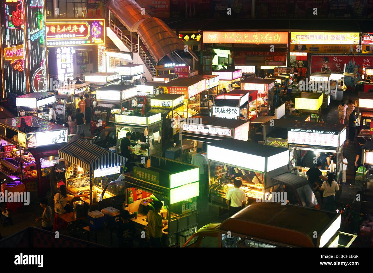 Aerial photo shows the bustling night market in Lu'an City, east China ...