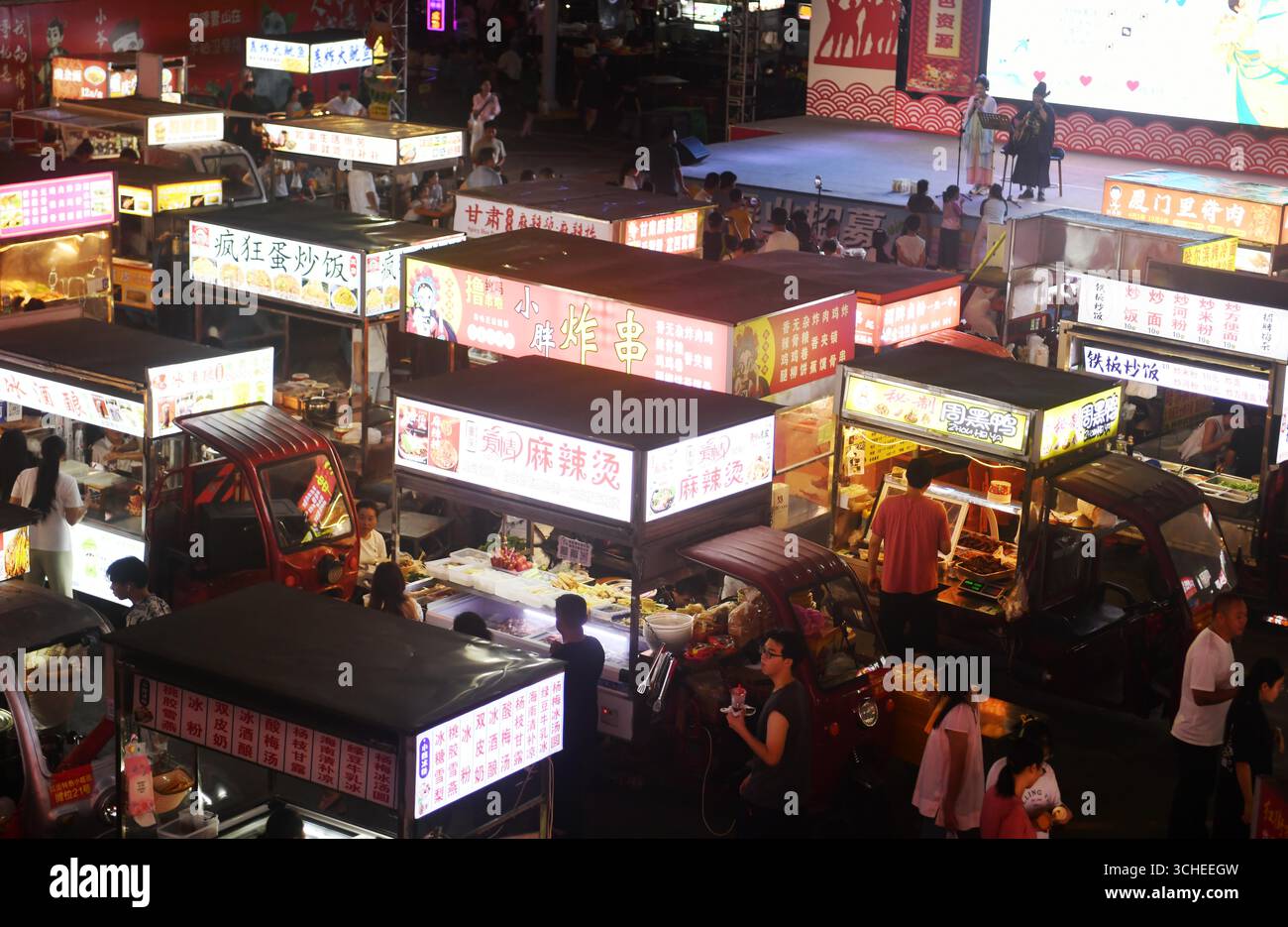 Aerial photo shows the bustling night market in Lu'an City, east China ...