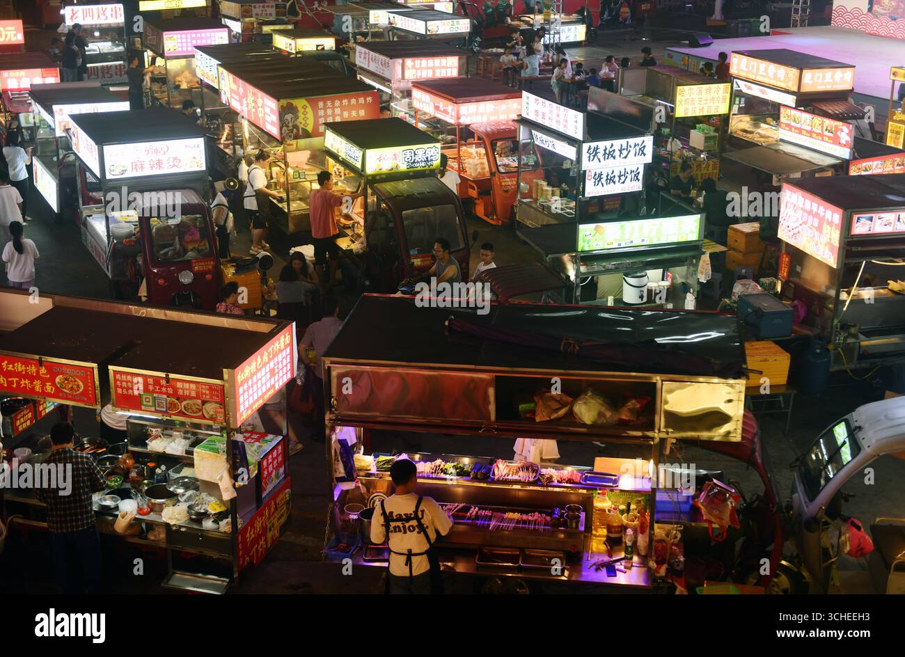 Aerial photo shows the bustling night market in Lu'an City, east China ...