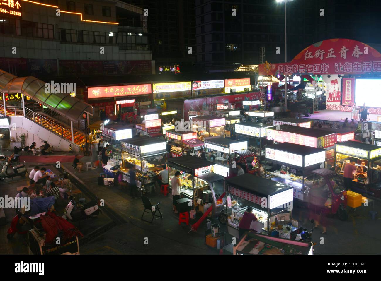 Aerial photo shows the bustling night market in Lu'an City, east China ...