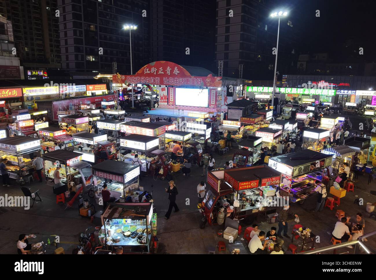 Aerial photo shows the bustling night market in Lu'an City, east China ...