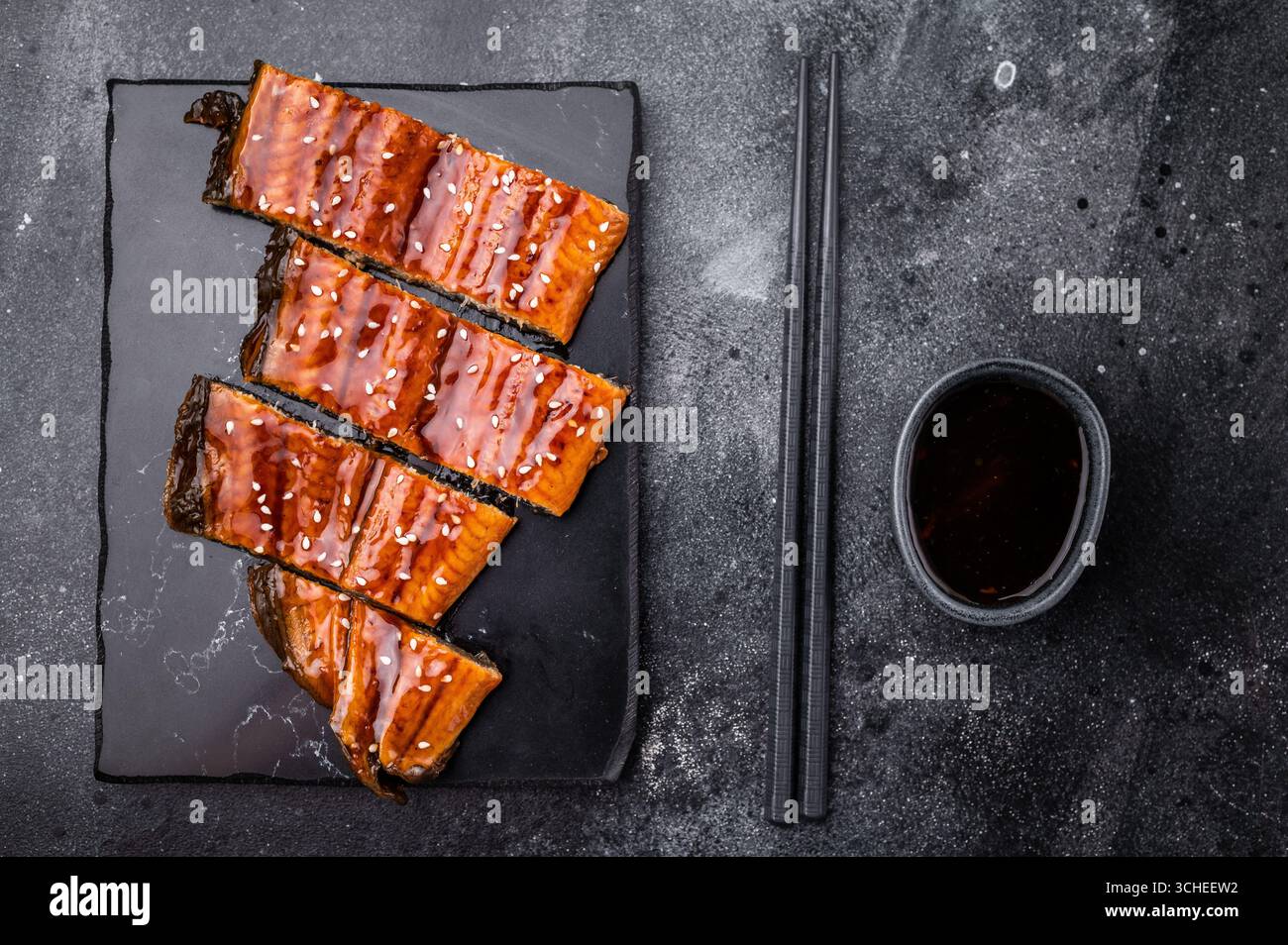 Unagi kabayaki eel, japanese grilled fish fillet with sauce. black ...