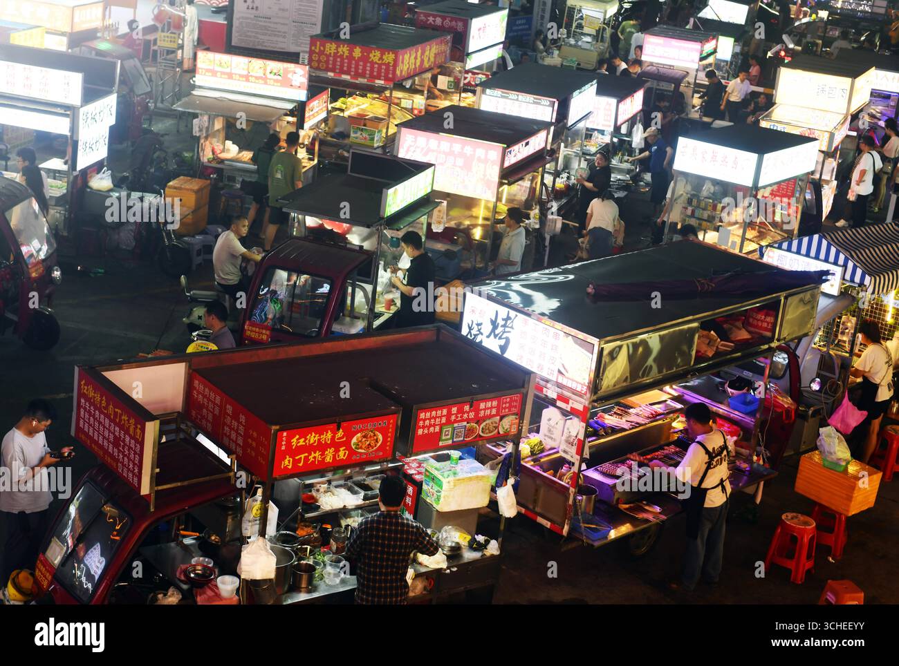 Aerial photo shows the bustling night market in Lu'an City, east China ...
