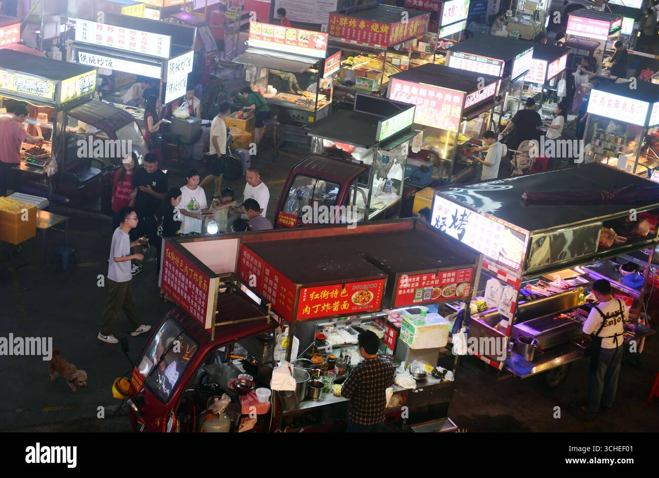 Aerial photo shows the bustling night market in Lu'an City, east China ...