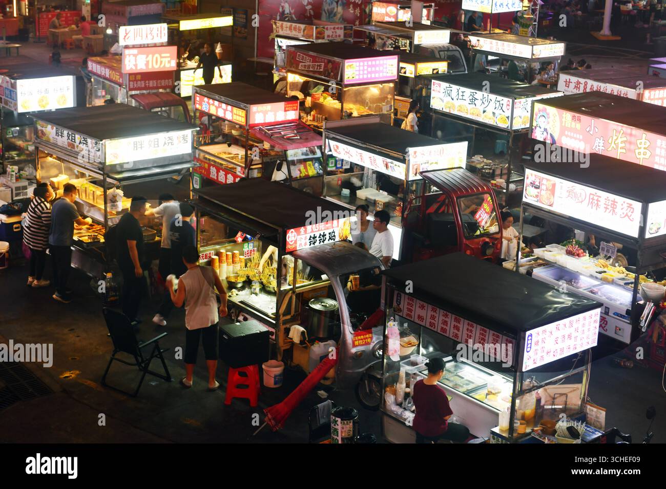 Aerial photo shows the bustling night market in Lu'an City, east China ...