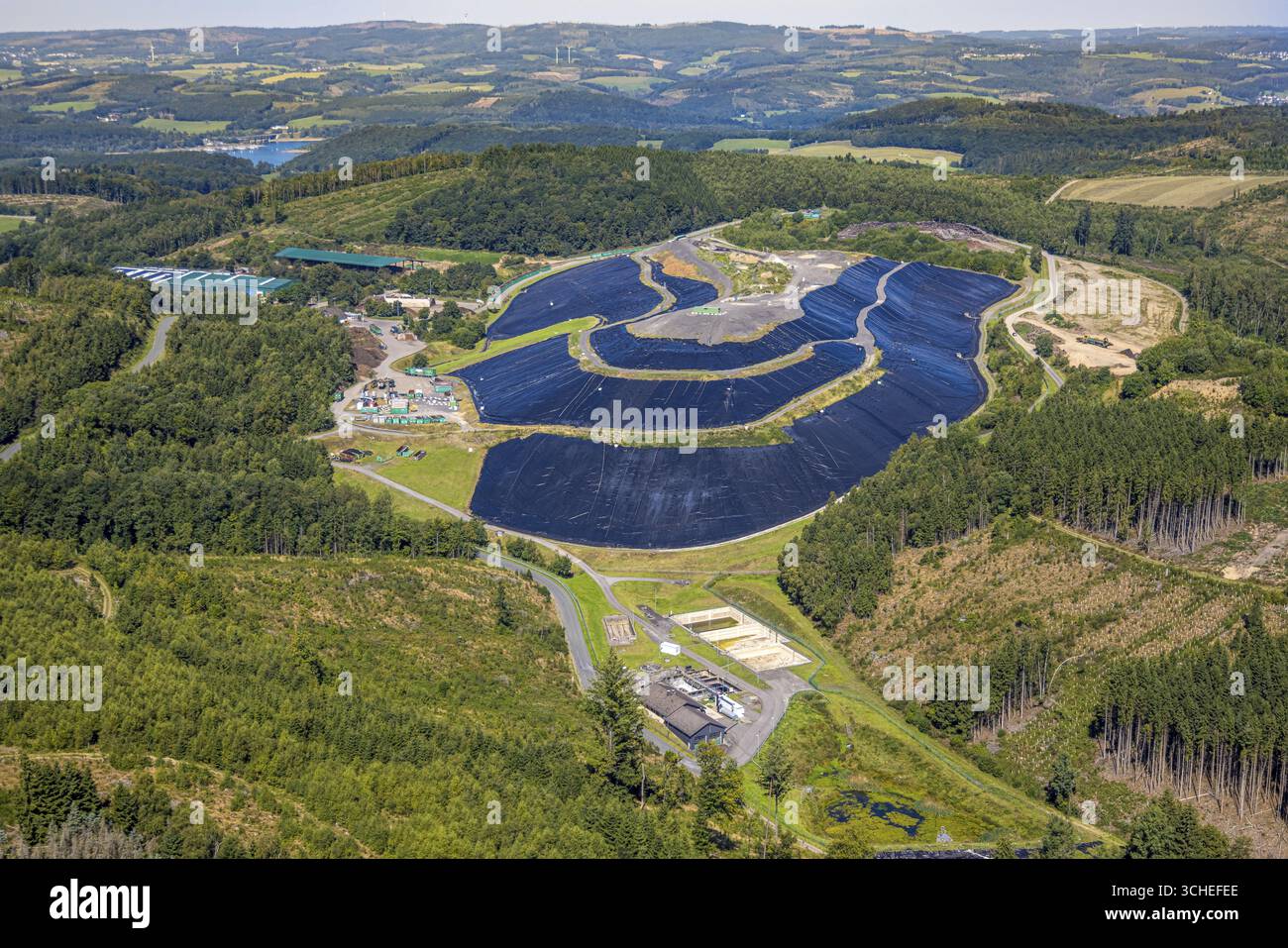 Heap waste covered tarpaulin hi-res stock photography and images - Alamy