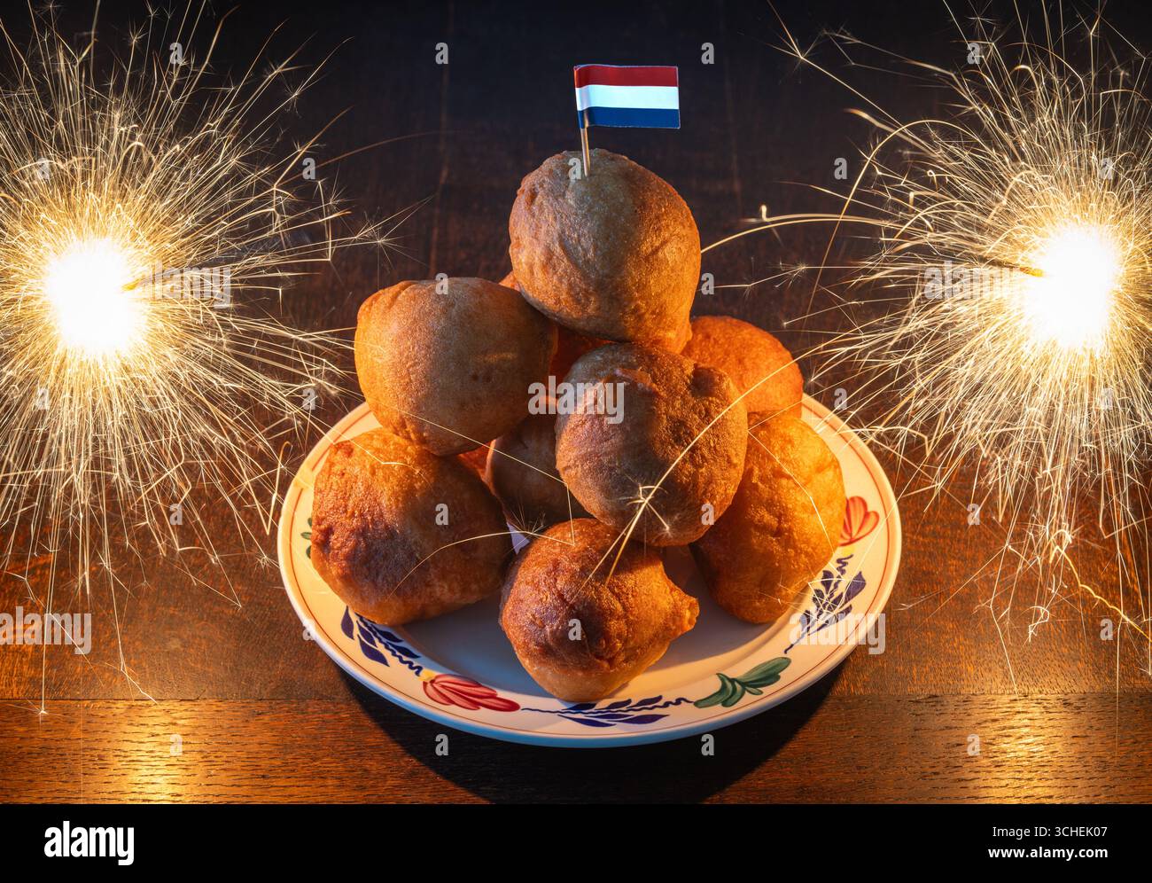 Festive display of typical dutch New Year's Eve treat Oliebollen ...