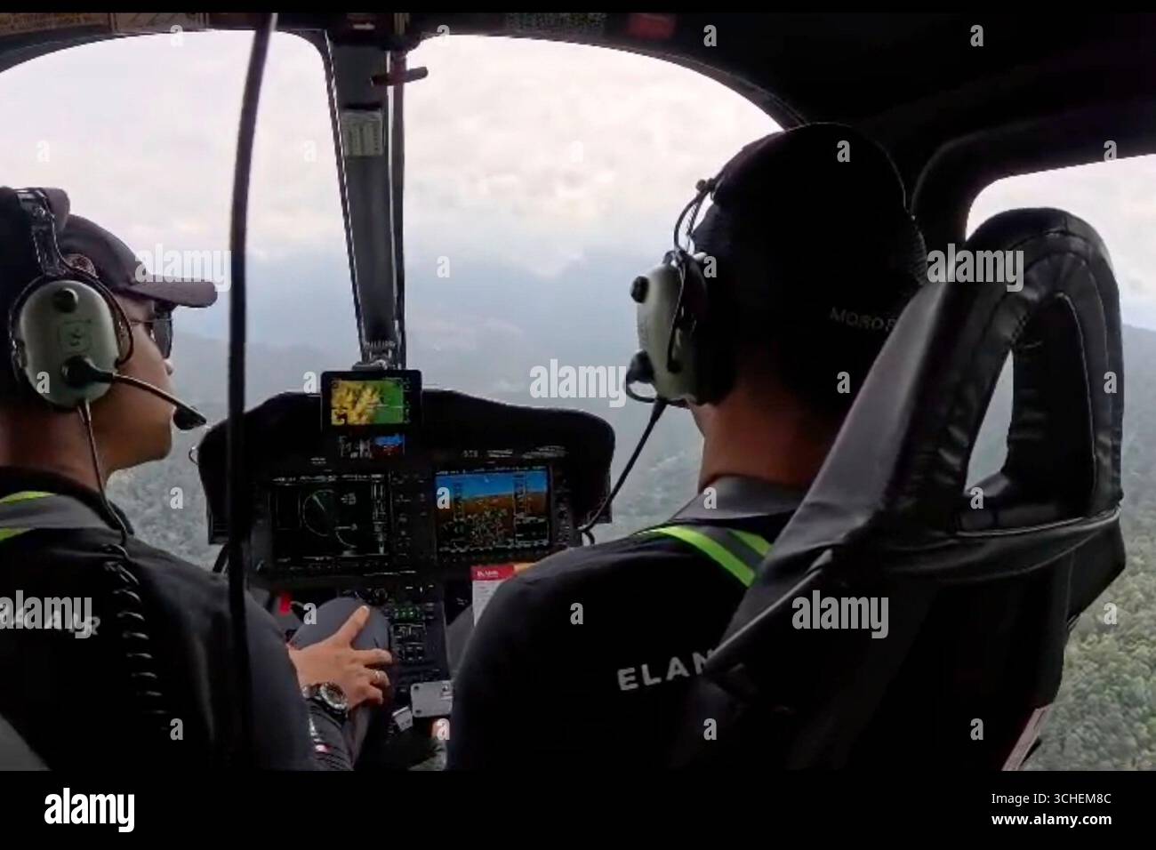 In this photo made from video released by Banjarmasin Search and Rescue ...