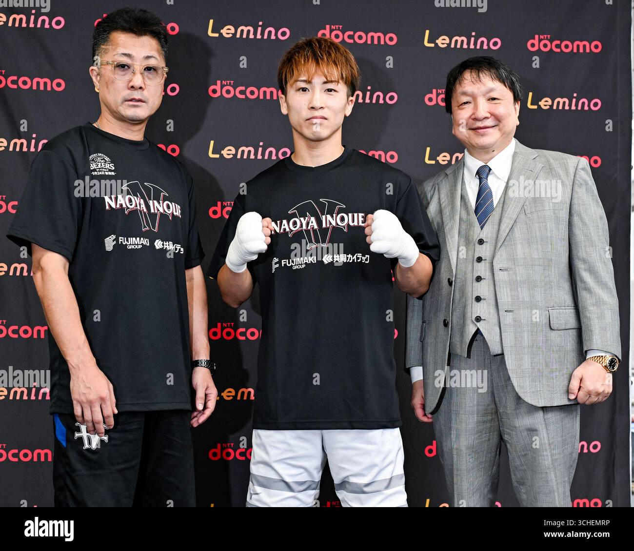 Naoya Inoue (center) of Japan poses for a photo session with his ...