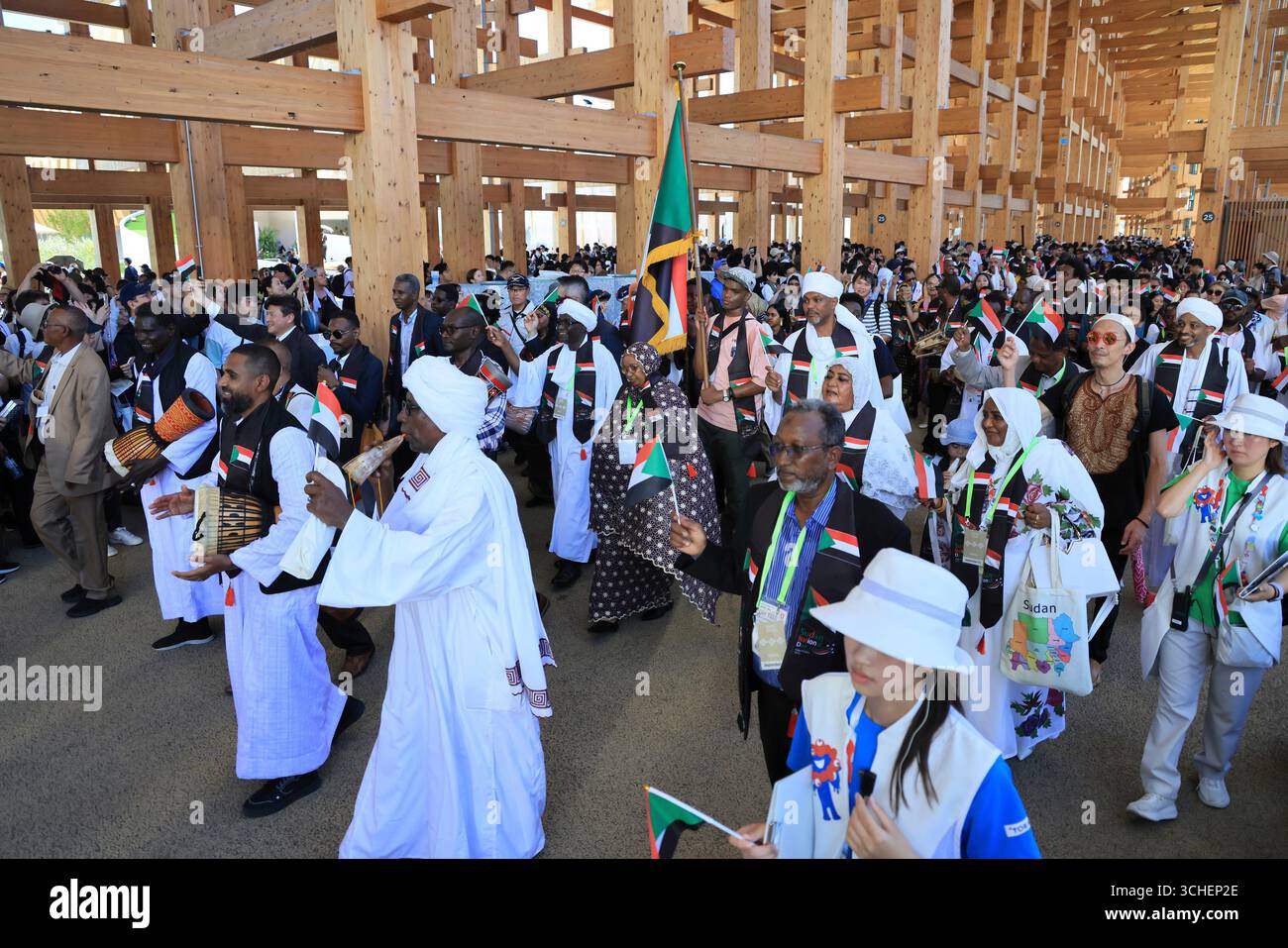 The photo shows the Sudanese Parade at the 2025 Osaka-Kansai Expo ...